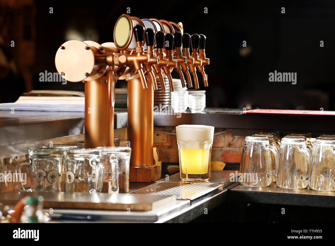 Draught beer taps hi-res stock photography and images - Alamy