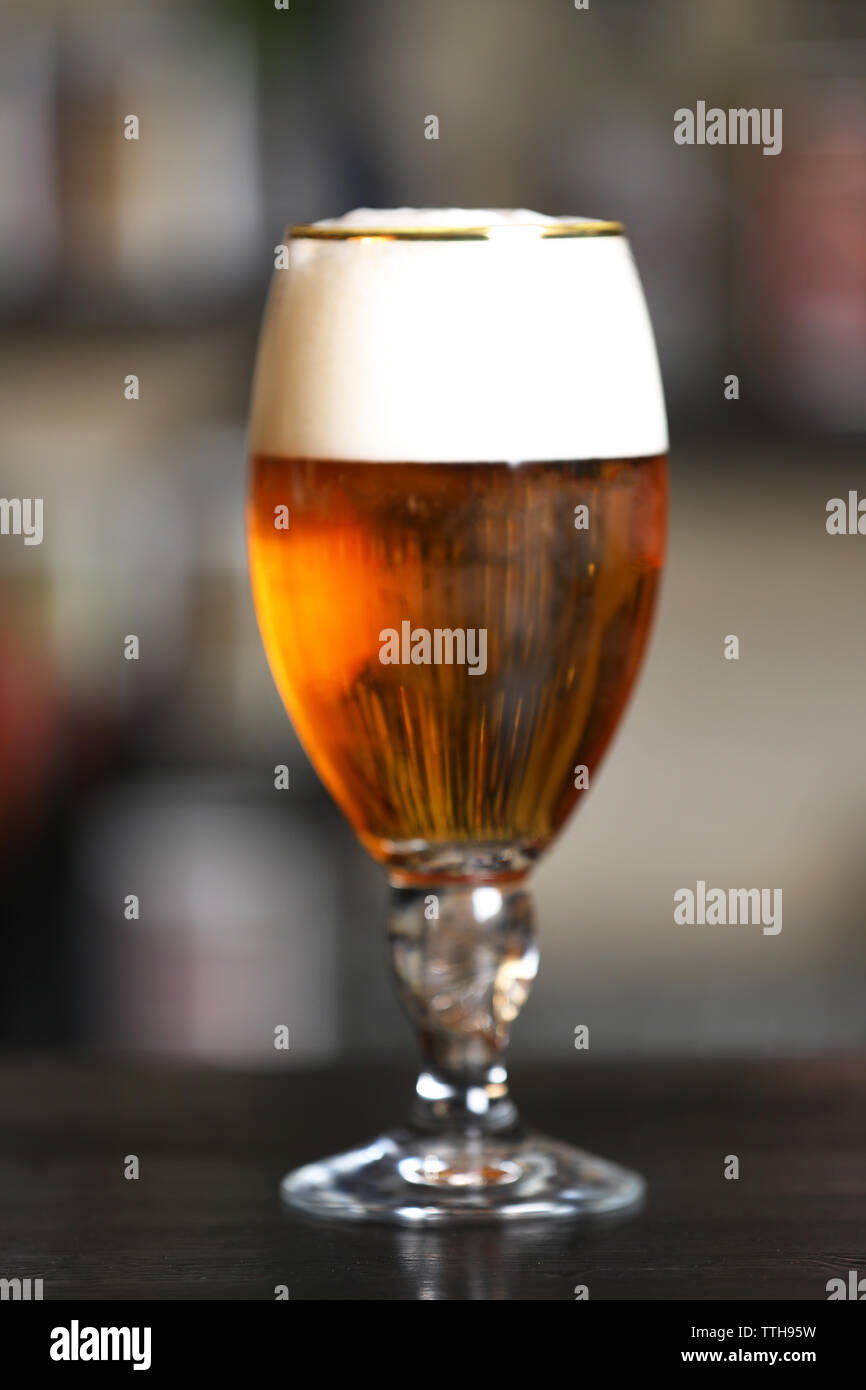 Glass of beer in a bar, close up Stock Photo - Alamy