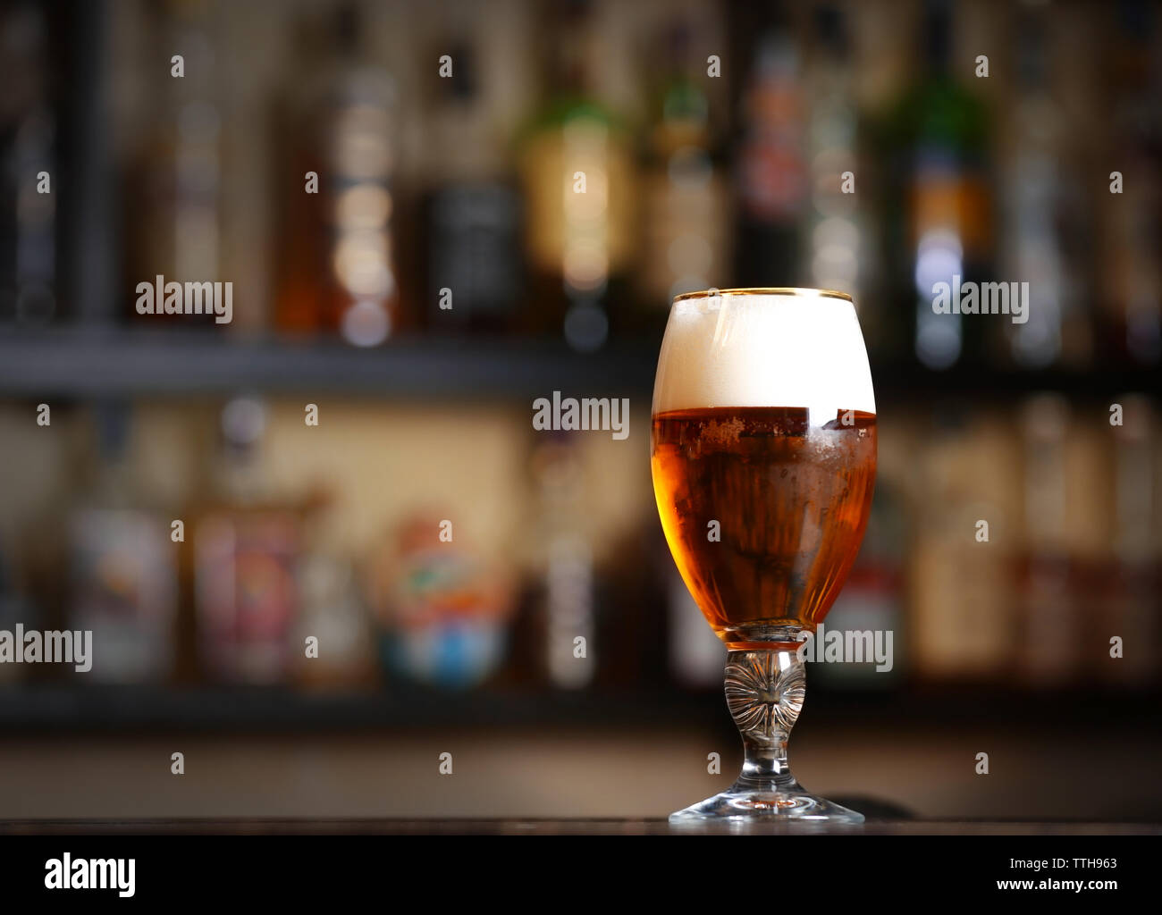 Glass of beer in a bar, close up Stock Photo - Alamy