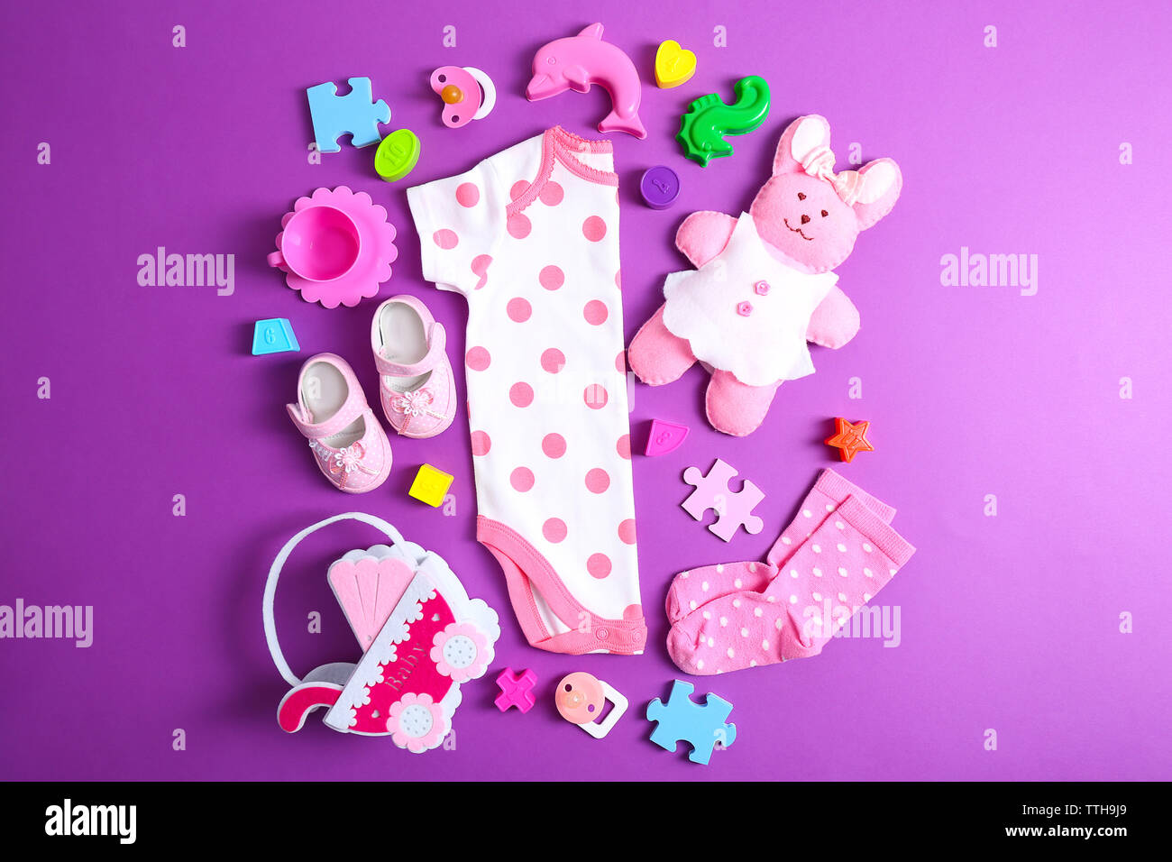 Kids setting on purple background Stock Photo - Alamy