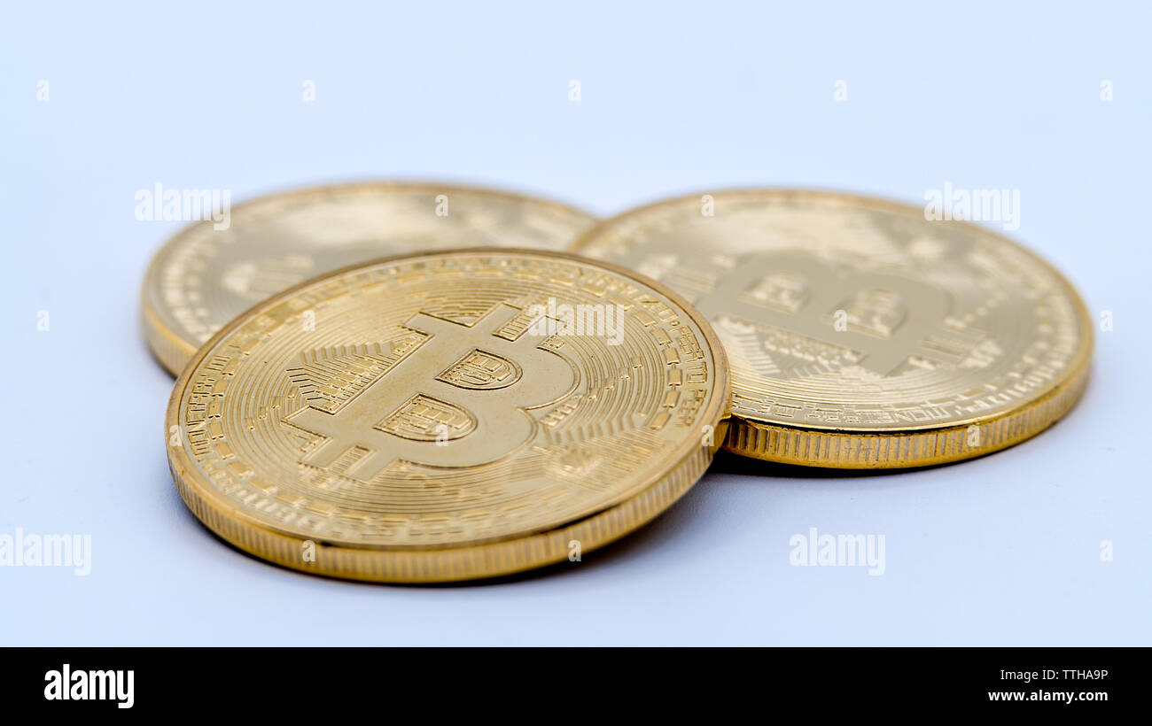 Physical metal golden Bitcoin currency on white background. New ...