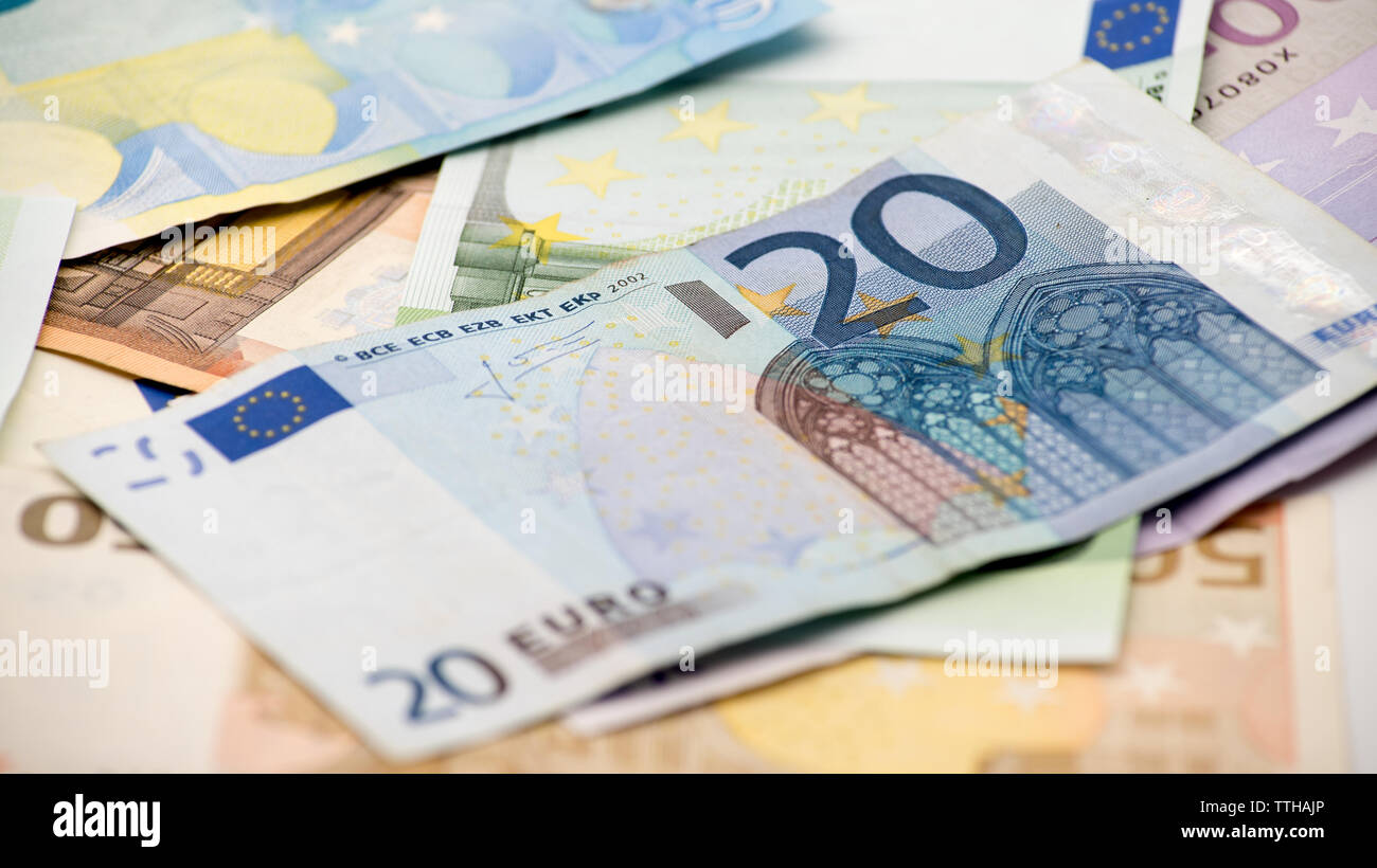 Euros bills of different values. Euro bill of twenty over others bills ...