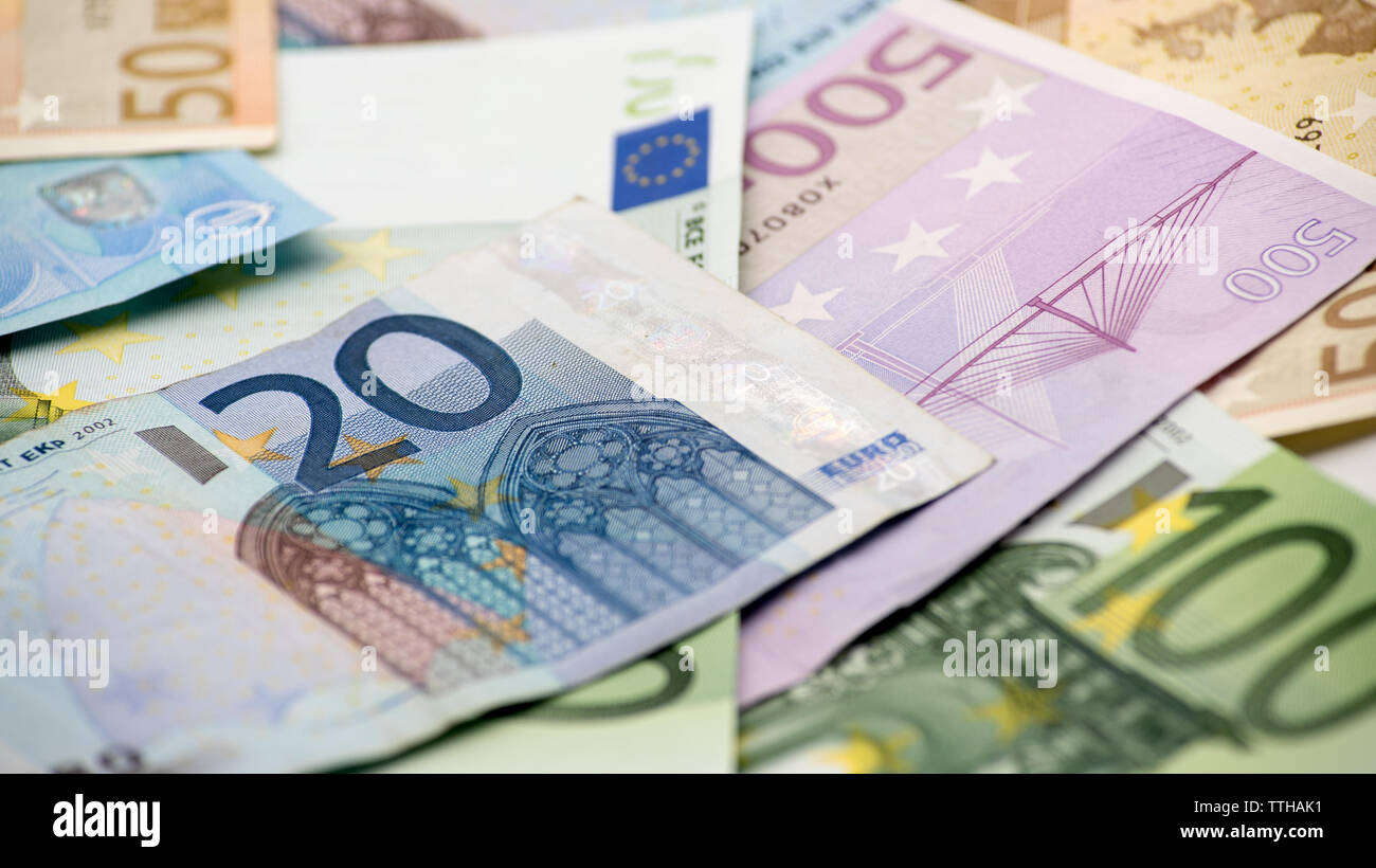 Euros bills of different values. Euro bill of twenty over others bills ...