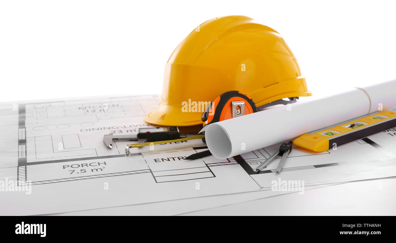 Project drawings and yellow helmet isolated on white Stock Photo - Alamy
