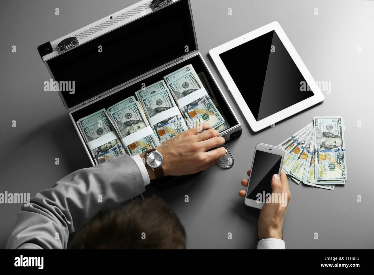 Money cellphone hi-res stock photography and images - Alamy