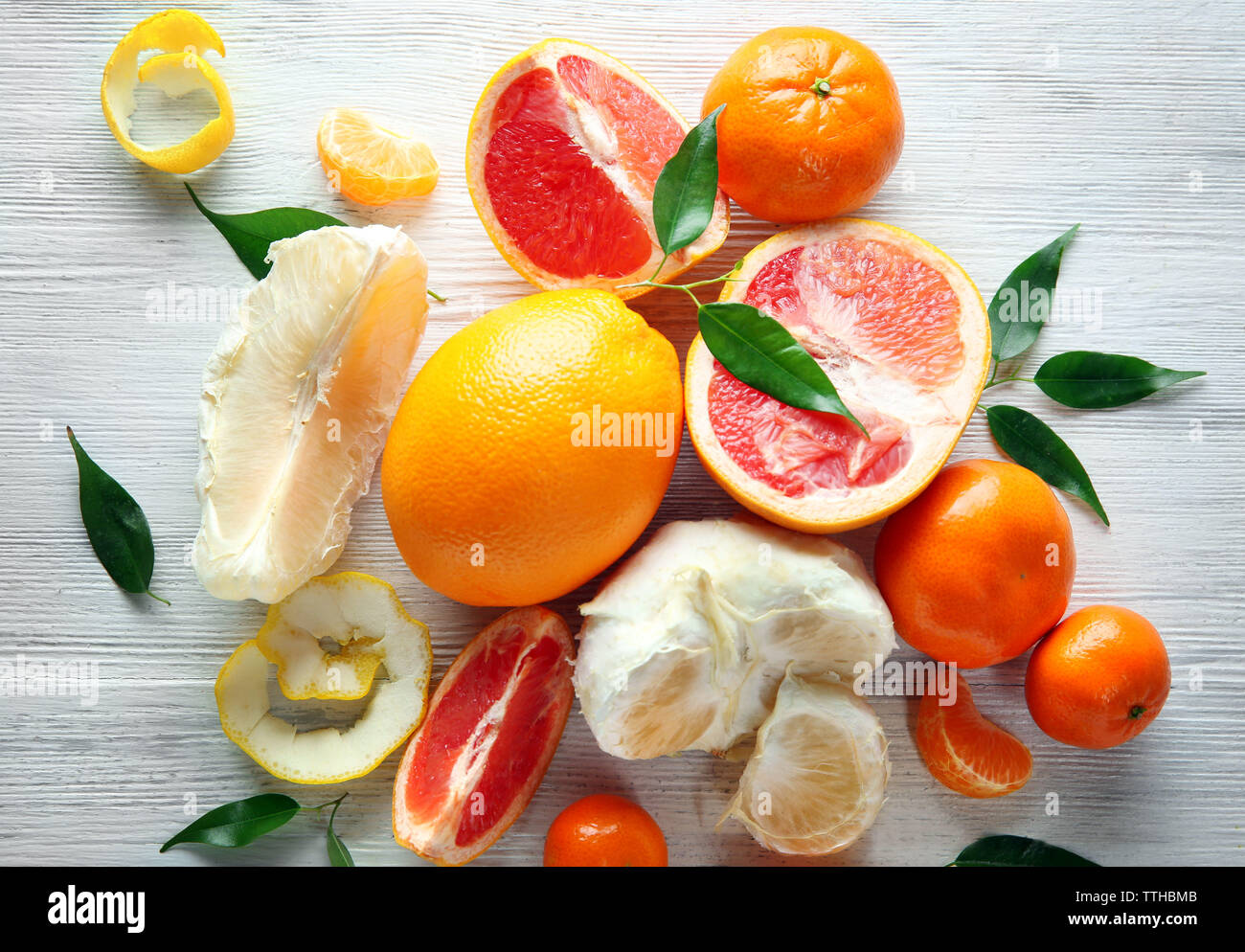 Fresh citrus fruits on a white background Stock Photo - Alamy