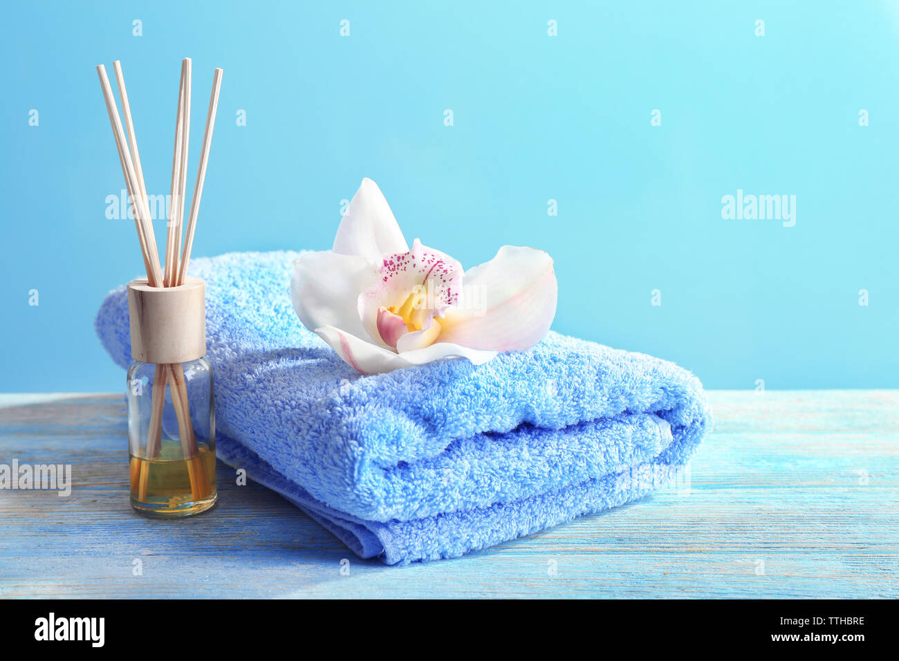 Spa treatment on blue background Stock Photo - Alamy
