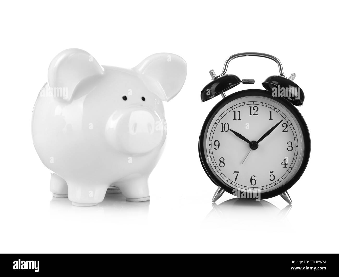 White piggy bank and clock isolated on white Stock Photo - Alamy