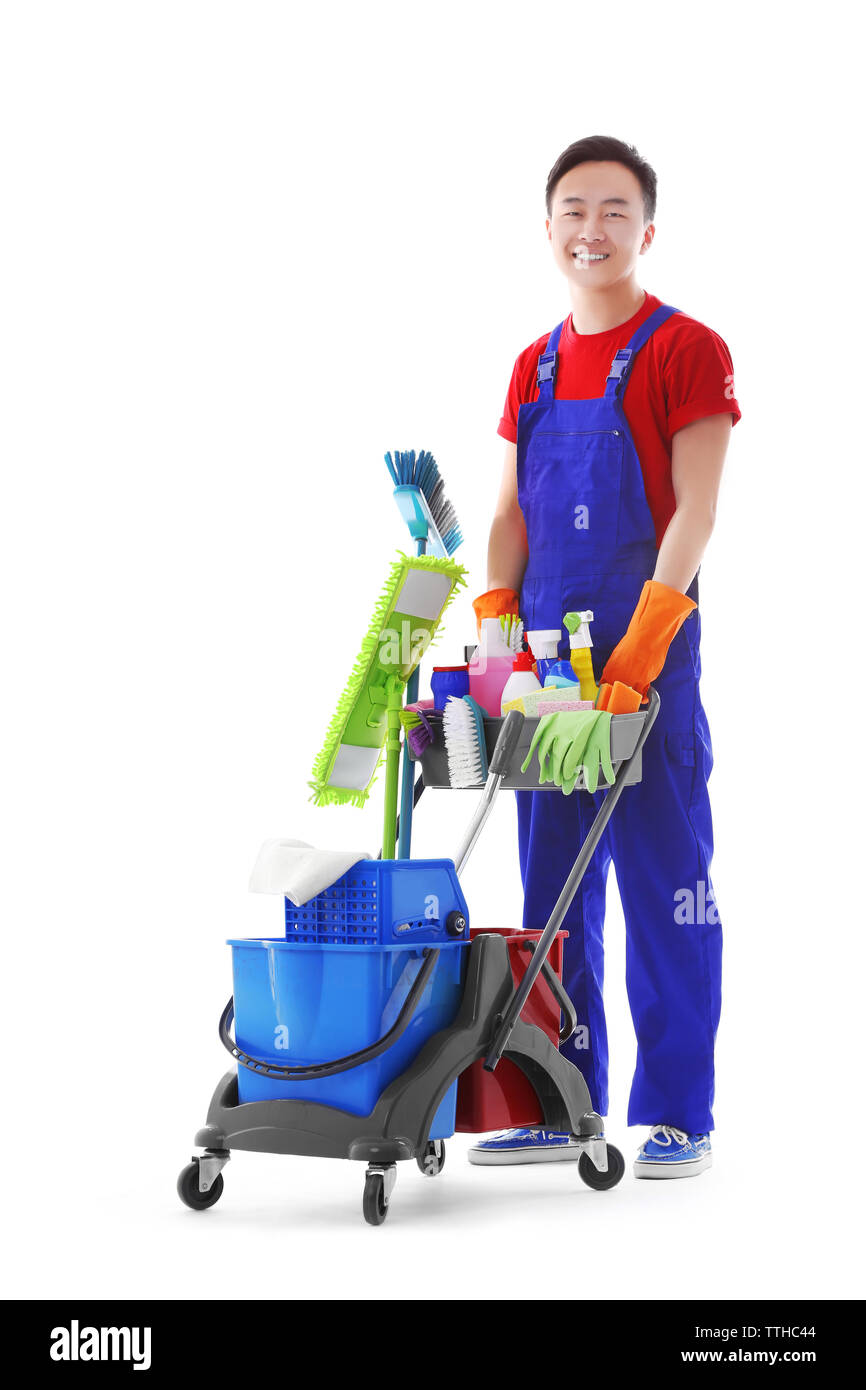 Young smiling male cleaner isolated on white Stock Photo - Alamy