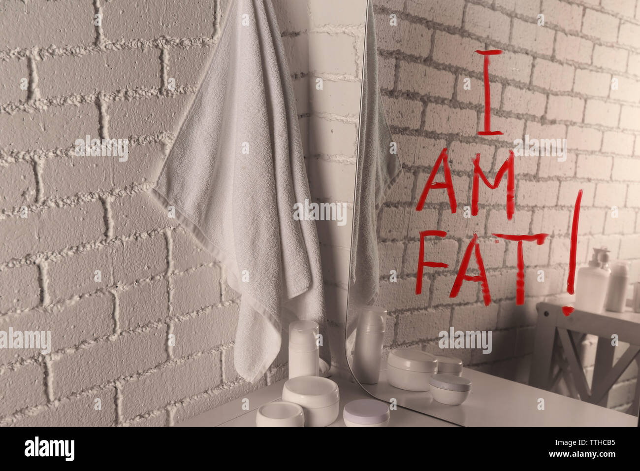 Text I AM FAT written on mirror in the bathroom Stock Photo - Alamy