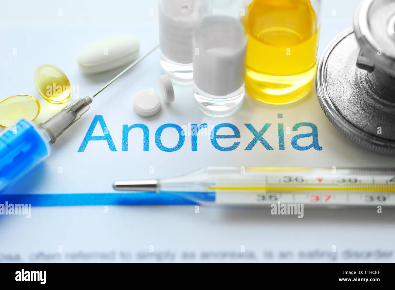 Medicines and Anorexia diagnosis written on paper closeup Stock Photo ...