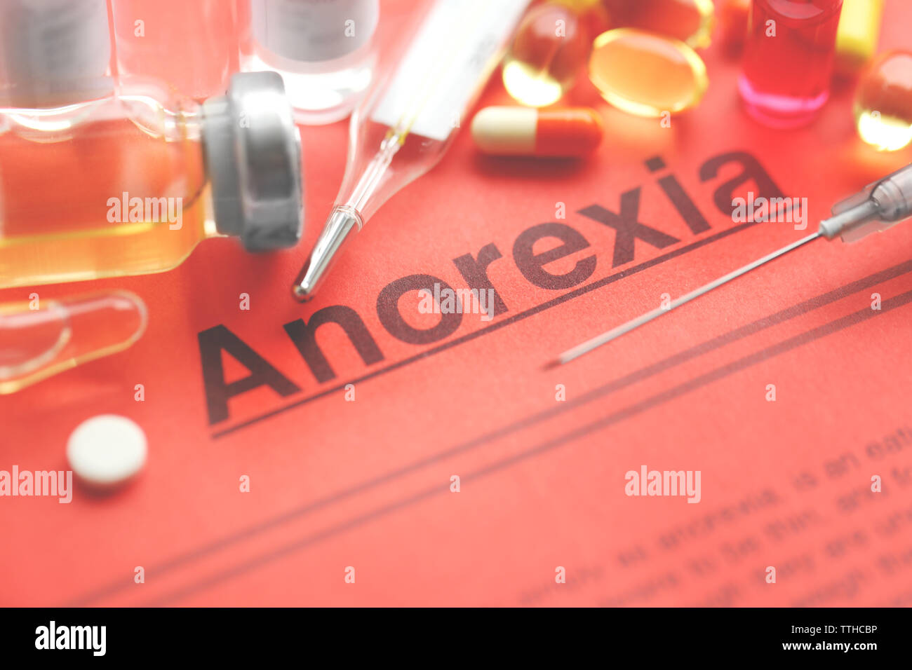 Medicines and Anorexia diagnosis written on paper closeup Stock Photo ...