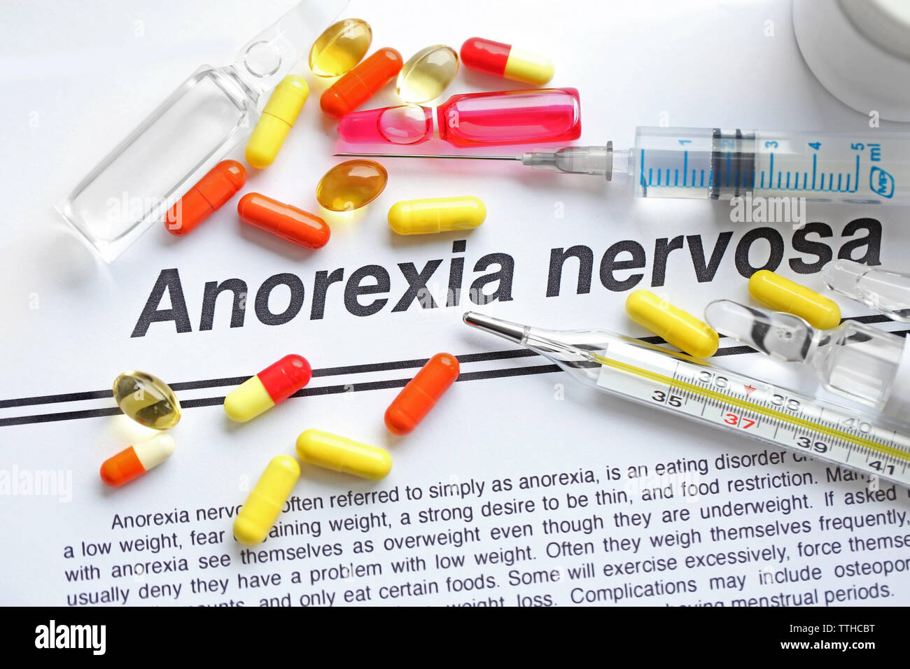 Medicines and Anorexia diagnosis written on paper closeup Stock Photo ...