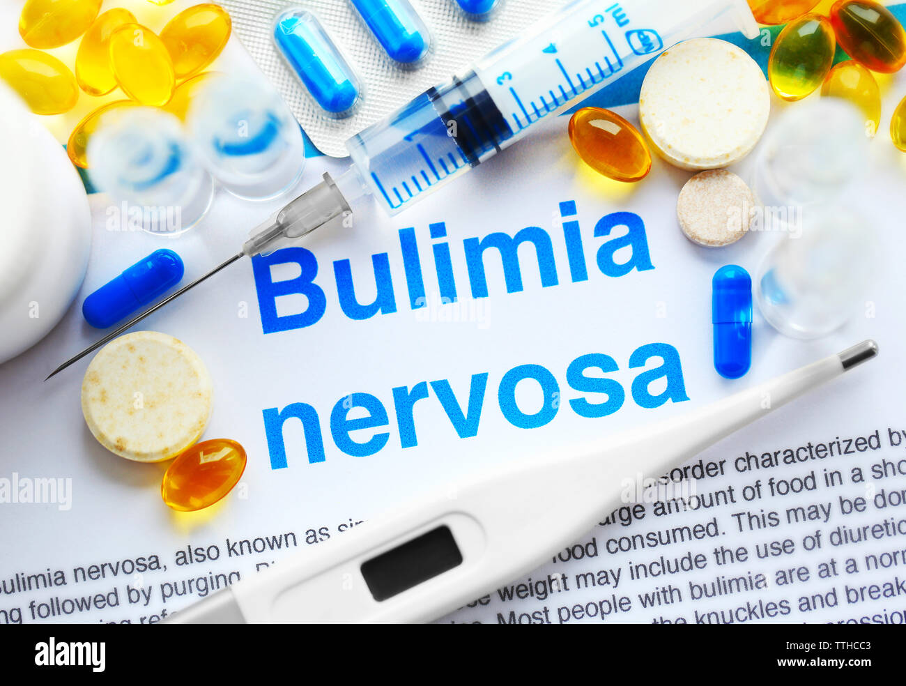Medicines and Bulimia diagnosis written on paper closeup Stock Photo ...