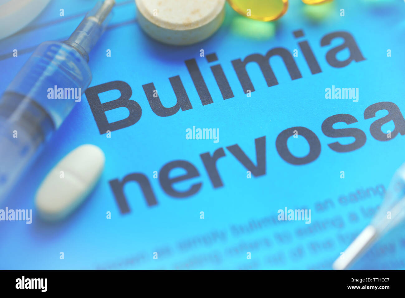 Medicines and Bulimia diagnosis written on paper closeup Stock Photo ...