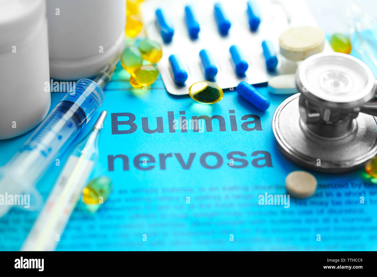 Medicines and Bulimia diagnosis written on paper closeup Stock Photo ...