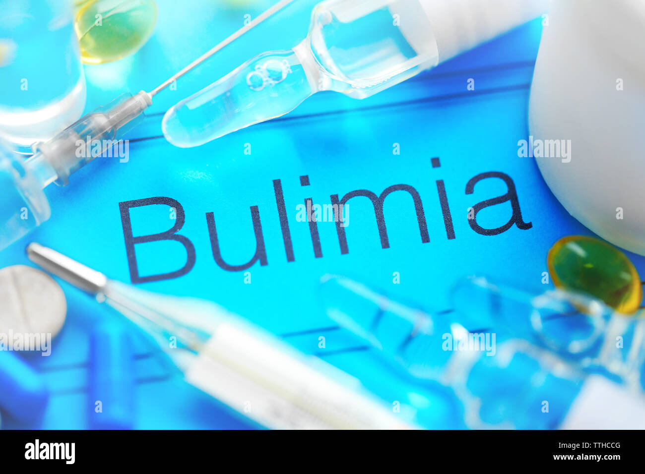 Medicines and Bulimia diagnosis written on paper closeup Stock Photo ...