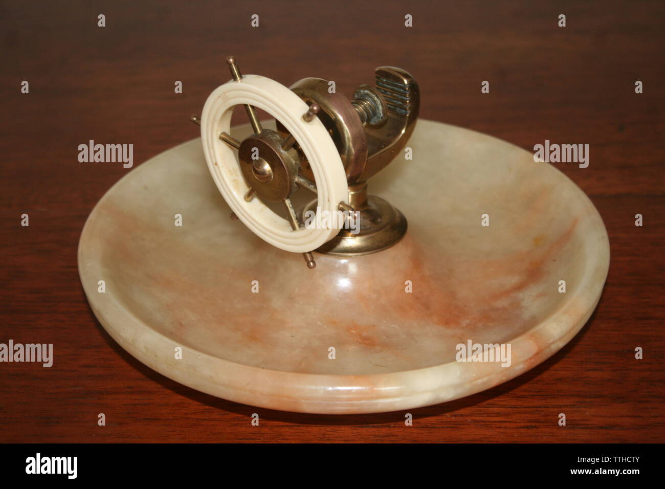 Art deco brass nut cracker machine from the nineteen forties with ...