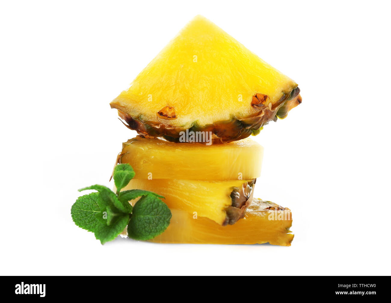 Stack of juicy pineapple slices with fresh mint, isolated on white ...
