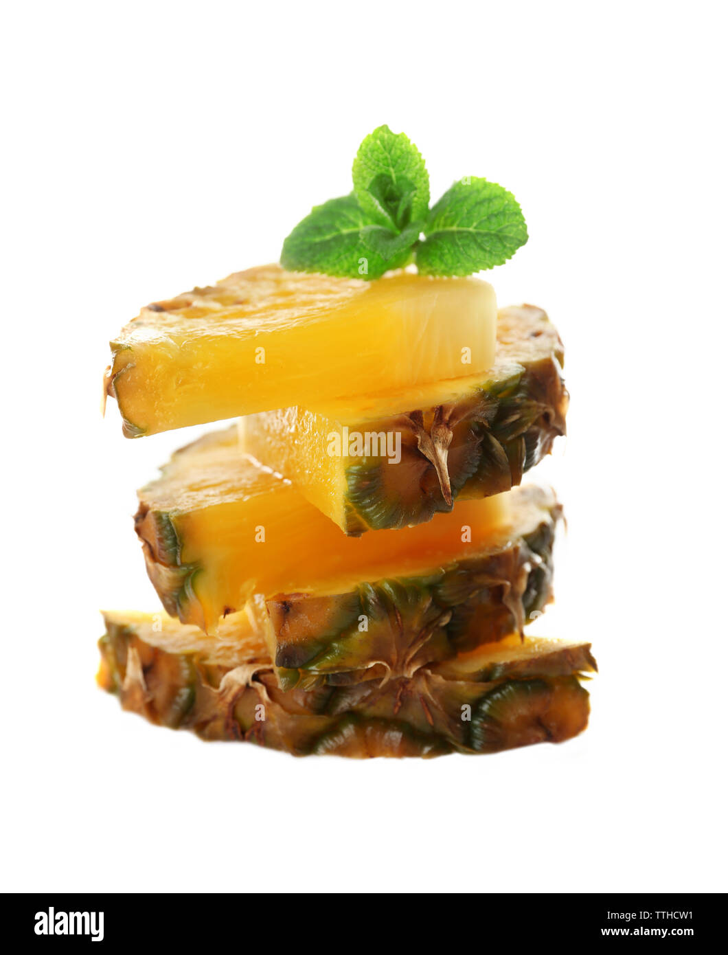 Stack of juicy pineapple slices with fresh mint, isolated on white ...