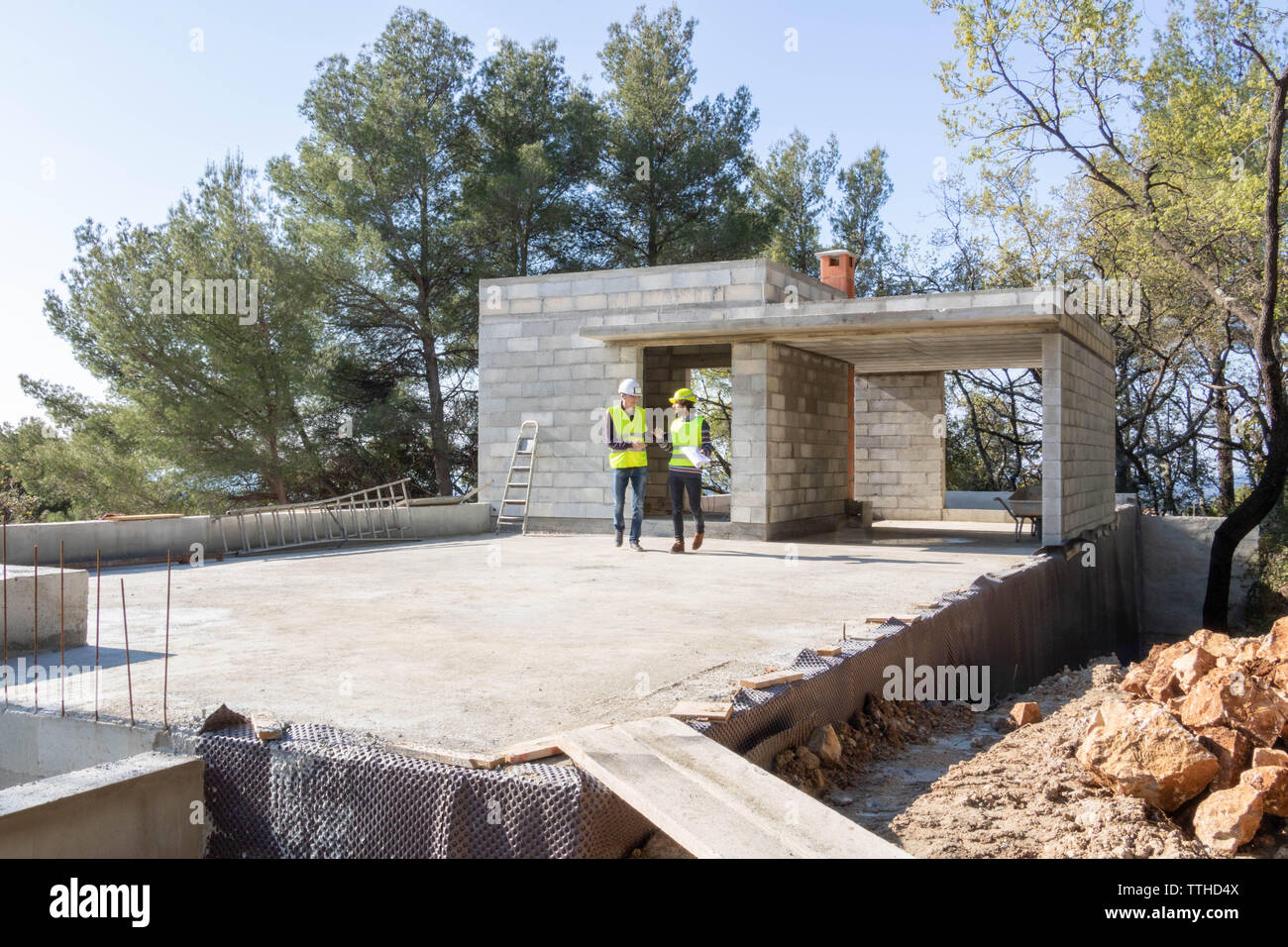 Construction site monitoring, building trades, site visit on site Stock ...