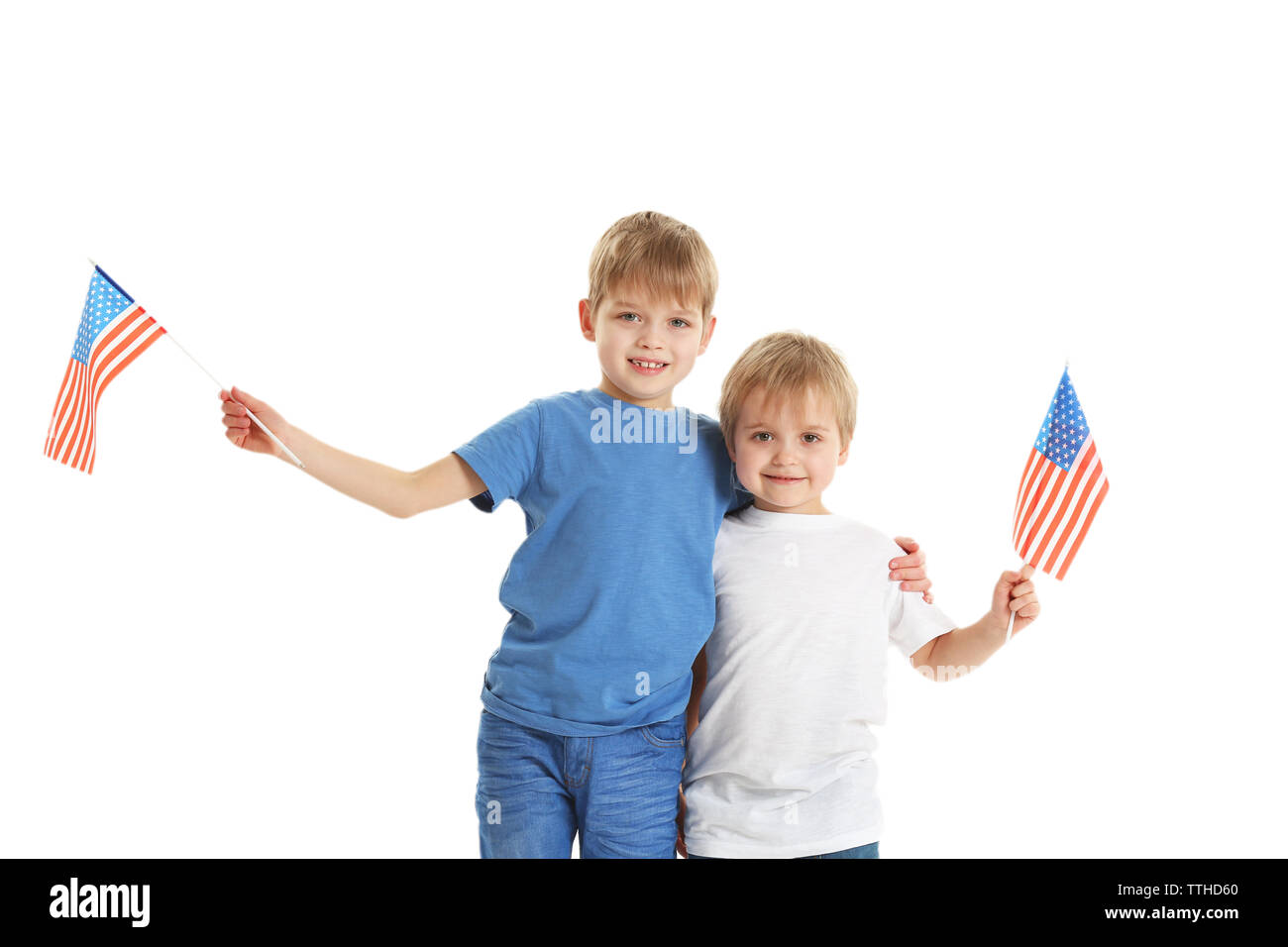 Two little boys with American flags isolated on white Stock Photo - Alamy