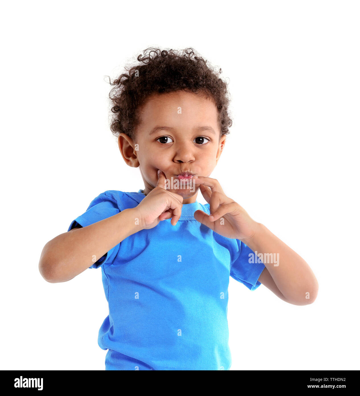 Little boy in blue shirt isolated on white background Stock Photo - Alamy