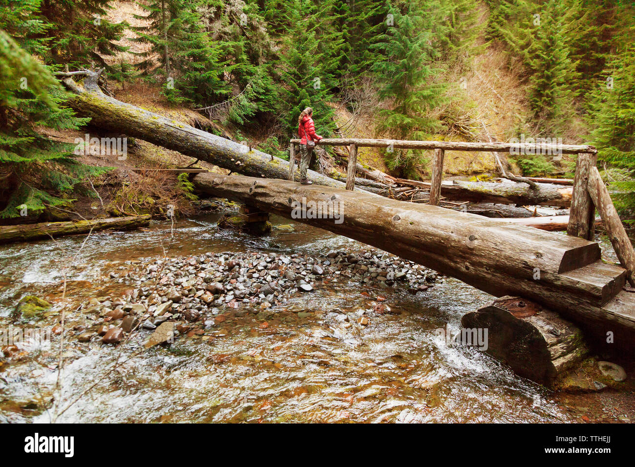 Woman on bridge over river hi-res stock photography and images - Alamy