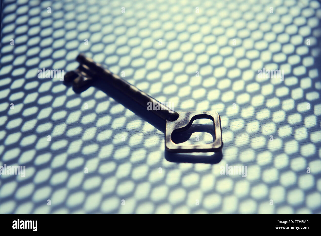 Old key grid shadow background Stock Photo - Alamy