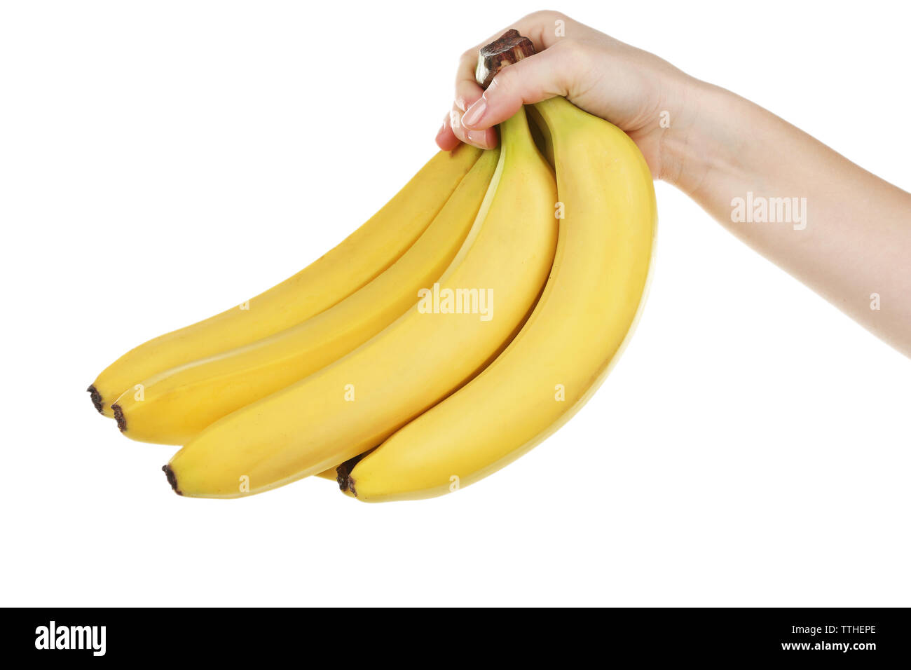 Female hand holding bunch of bananas isolated on white Stock Photo - Alamy