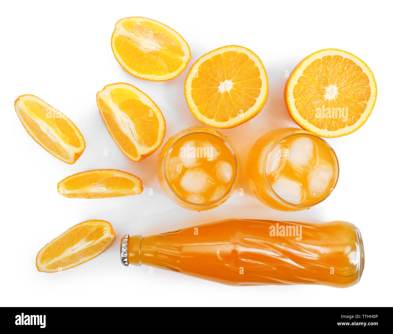 Iced orange drink with fresh pieces isolated on white Stock Photo - Alamy