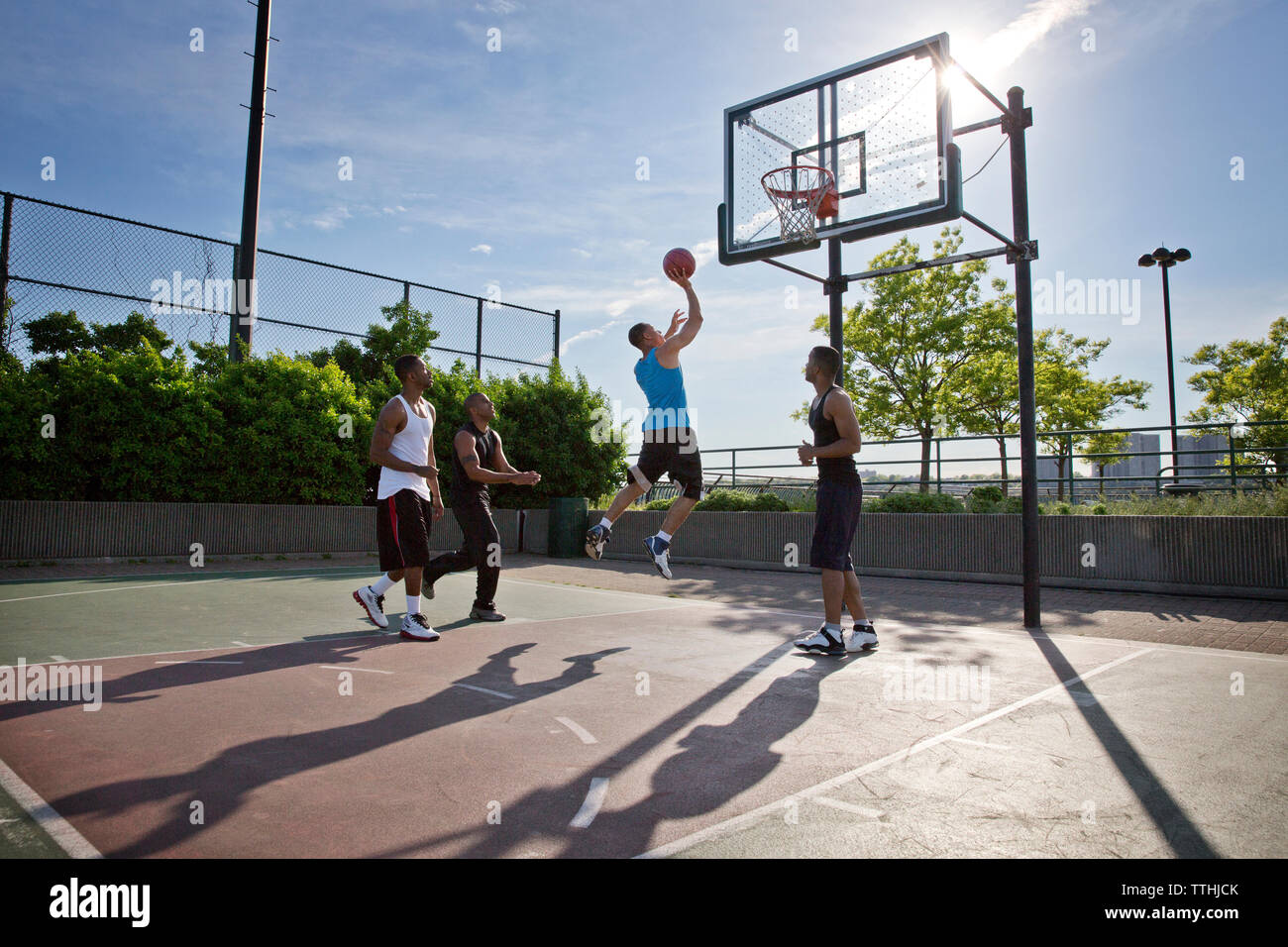 Group of friends head together air hi-res stock photography and images ...