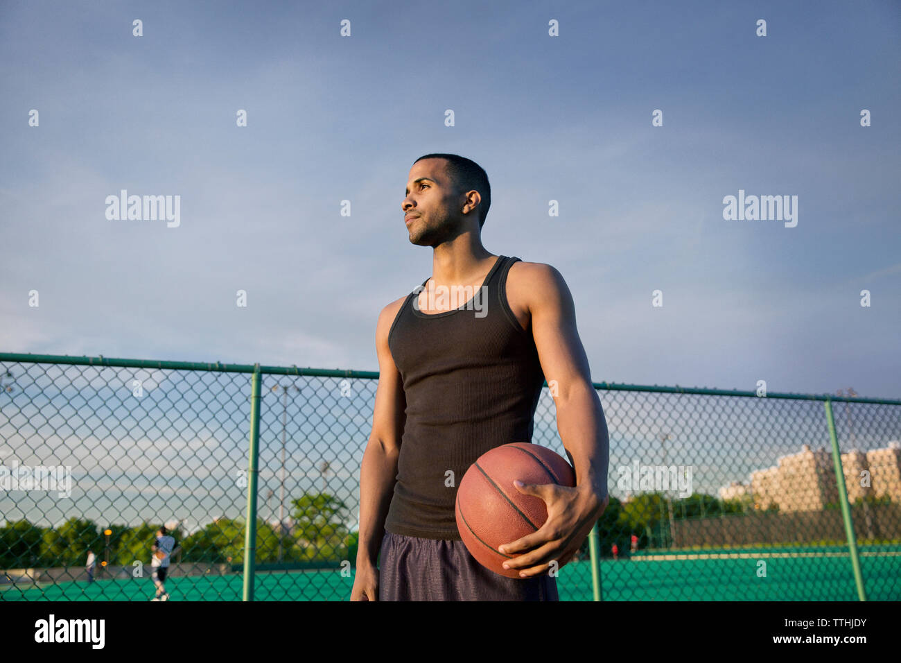 Black basketball player standing in hi-res stock photography and images ...