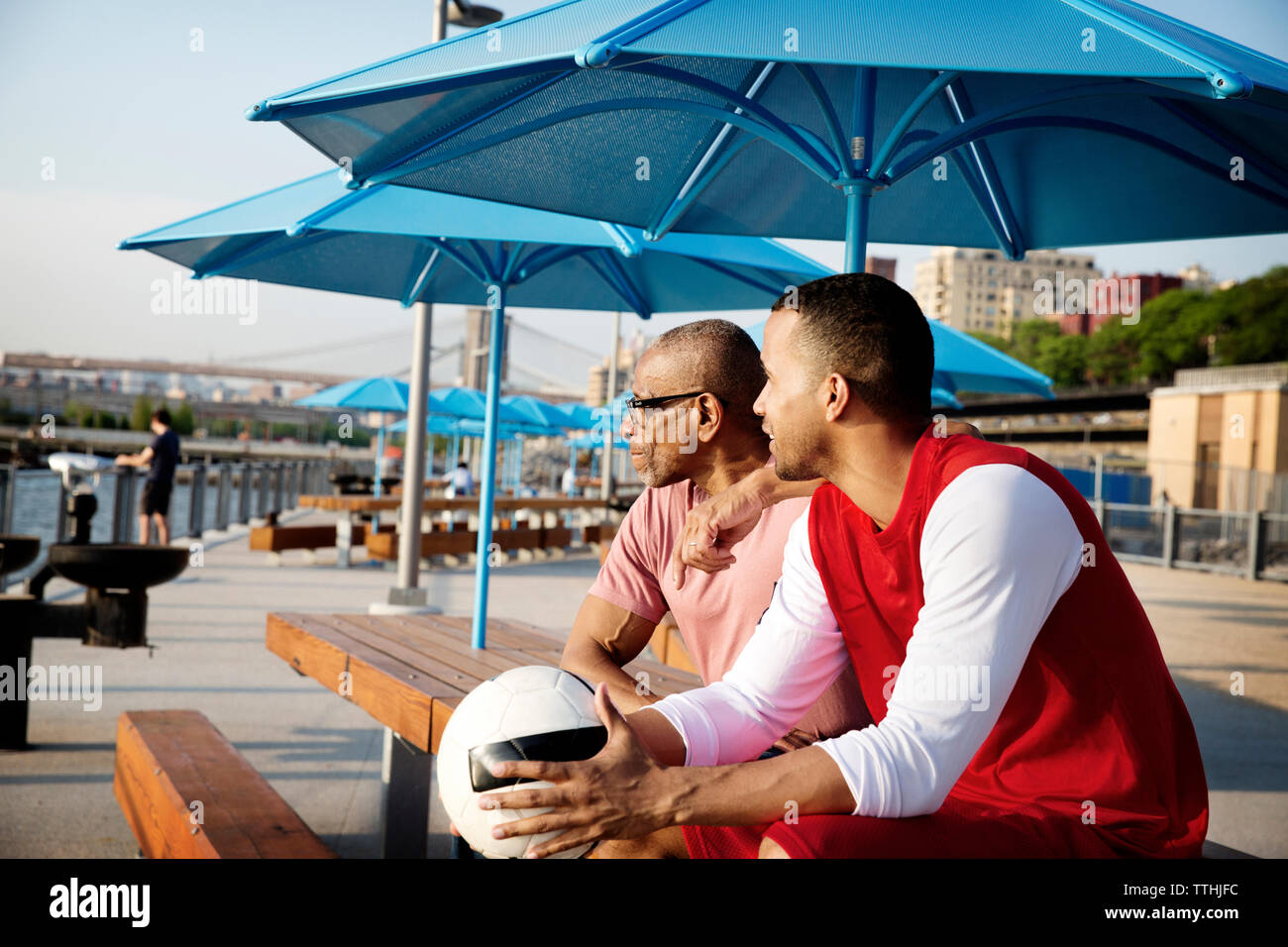 Son sitting on table soccer ball hi-res stock photography and images ...