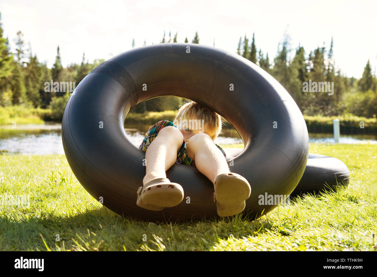 Boy inflatable ring hi-res stock photography and images - Alamy