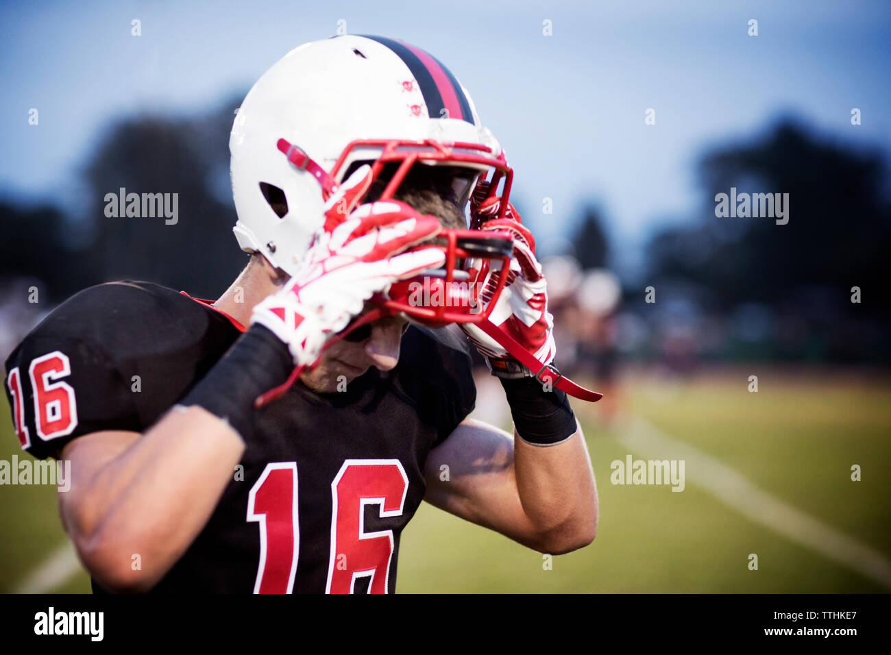 Competitive helmet player sport uniform hi-res stock photography and ...