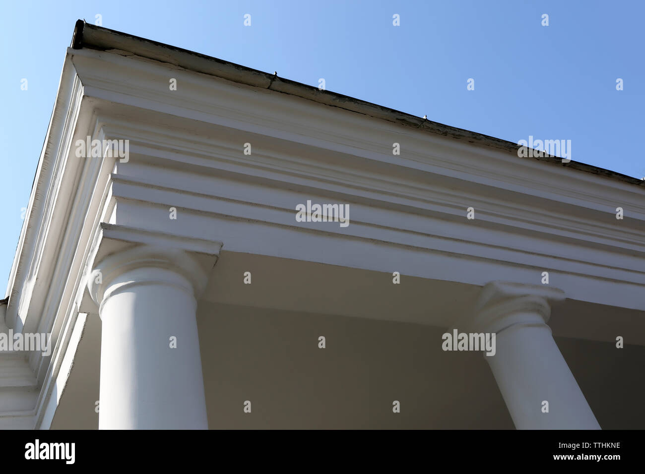 Roof with columns of an old building Stock Photo - Alamy