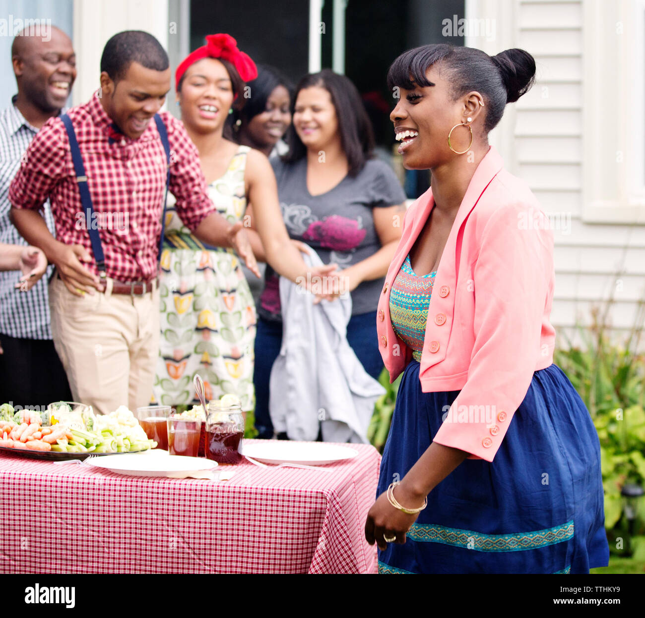Laughing group of friends table hi-res stock photography and images - Alamy