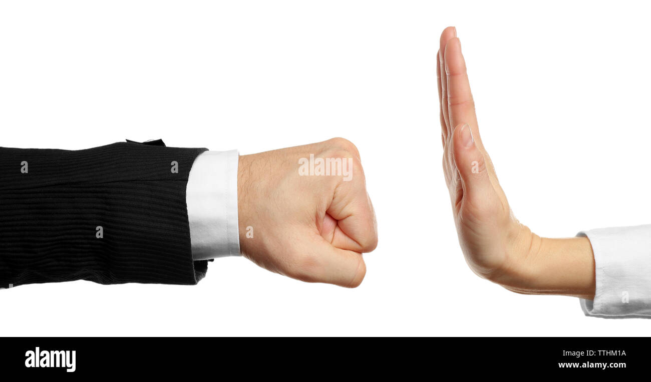 Woman hand stopping angry man fist, isolated on white Stock Photo - Alamy