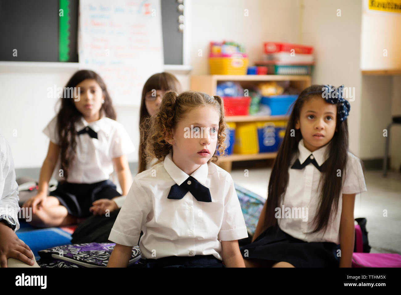Students listening in classroom hi-res stock photography and images - Alamy