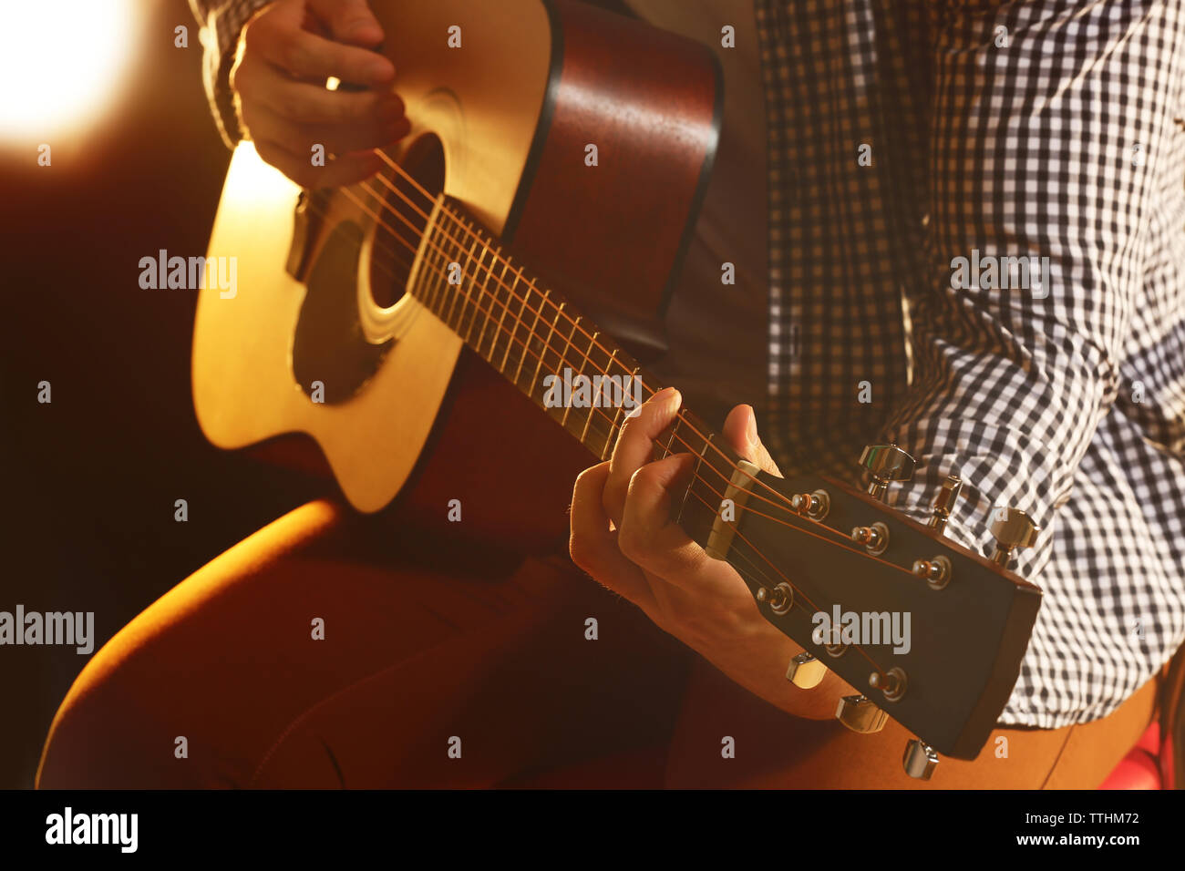 Man playing acoustic guitar Stock Photo - Alamy