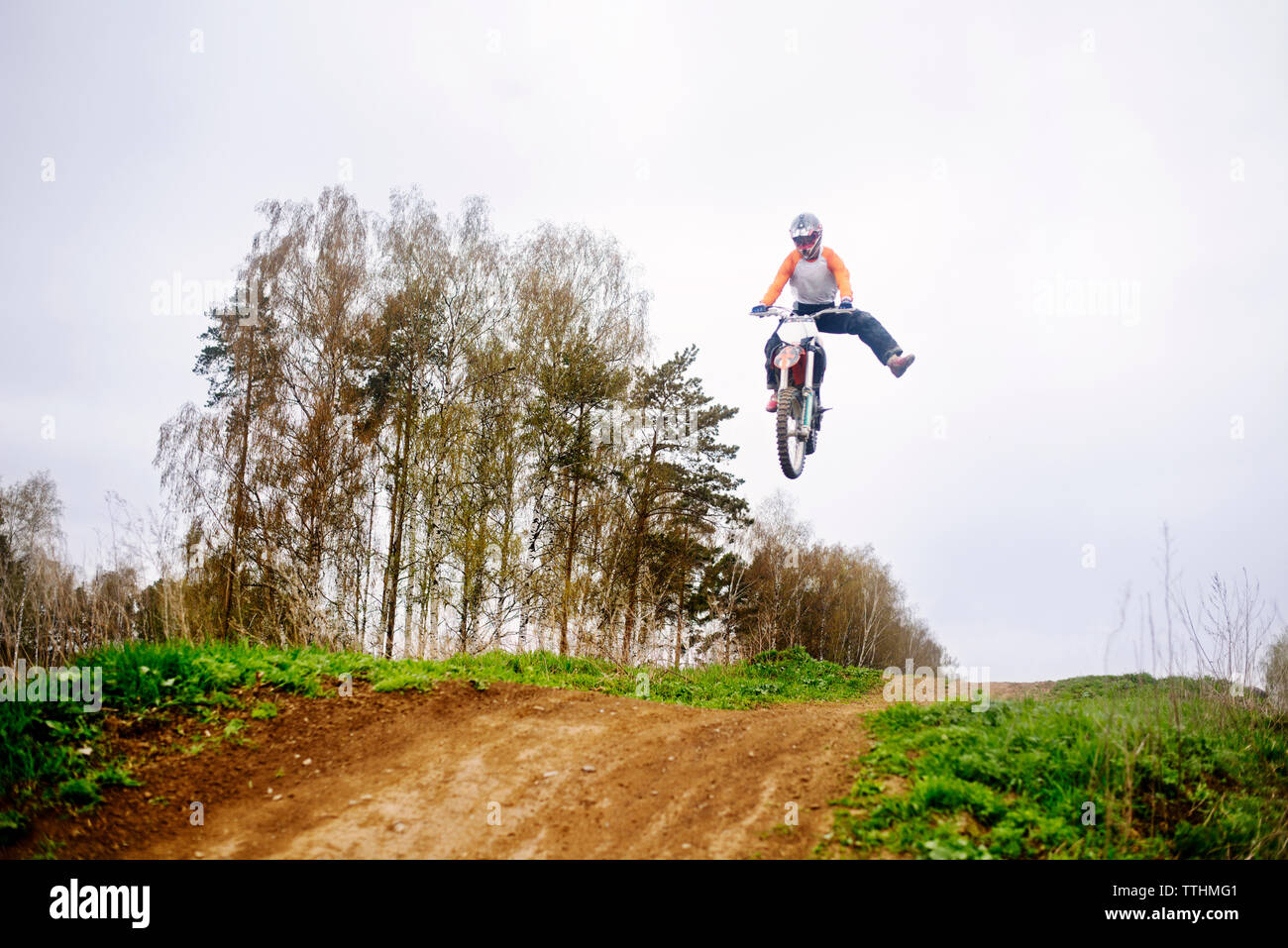 Biker Riding Motorcycle Low Angle High Resolution Stock Photography and ...