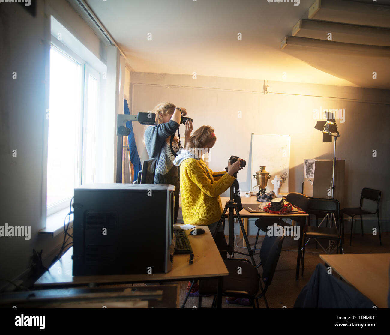 Standing working illuminated technology hi-res stock photography and ...