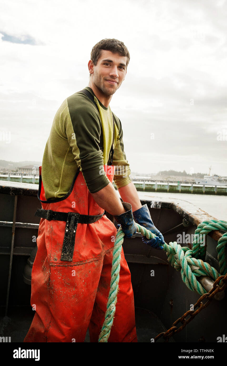 Fisherman pulling rope hi-res stock photography and images - Alamy