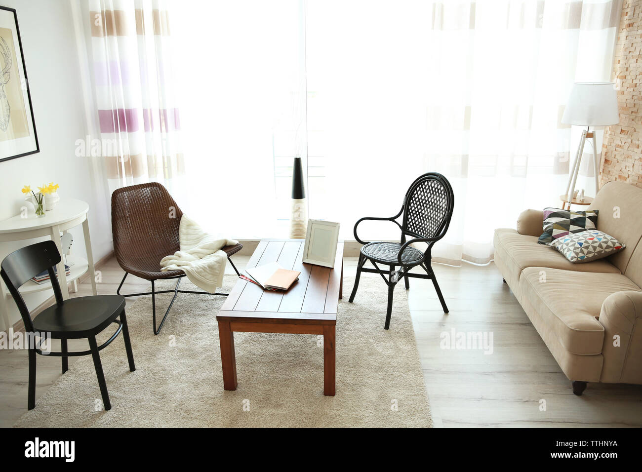 Modern living room interior. Different kinds of chair around table ...