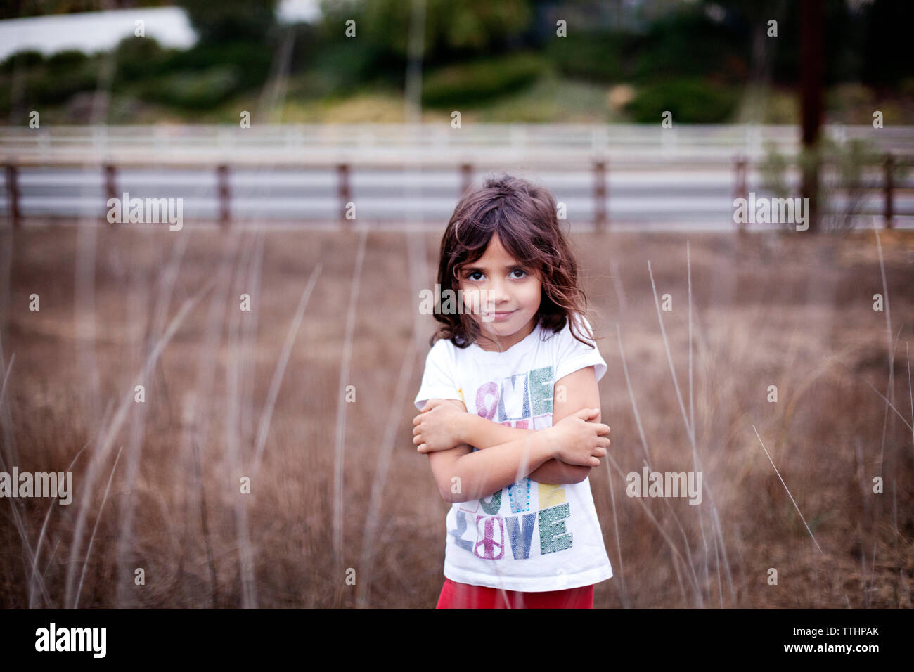 Cute girl arms crossed hi-res stock photography and images - Alamy