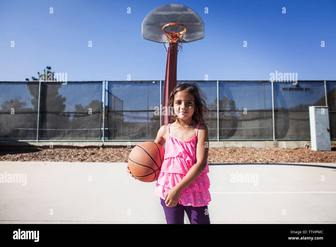 Girl basketball hoop hi-res stock photography and images - Alamy