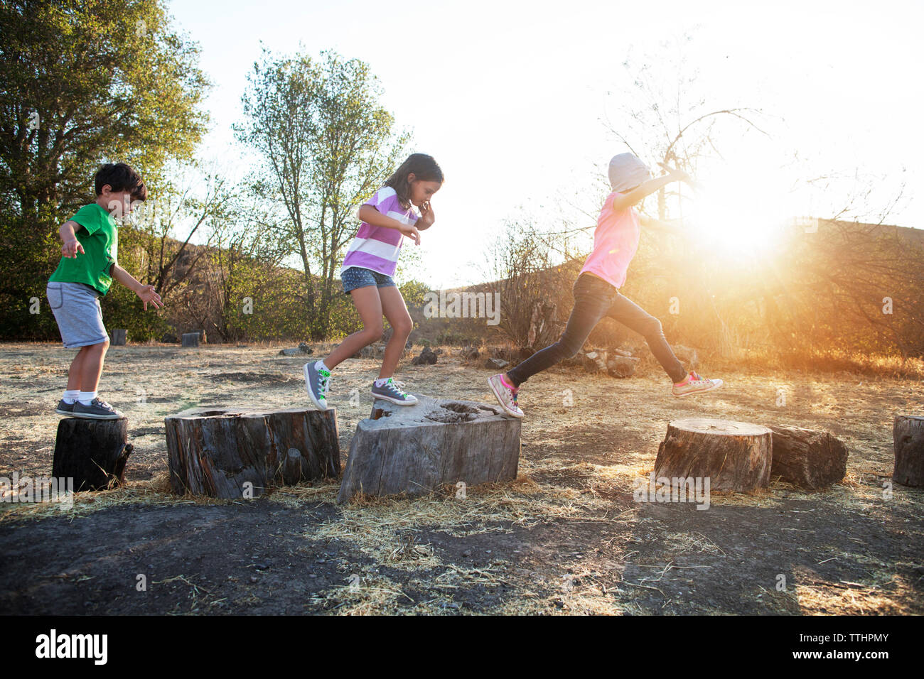 Children with stones hi-res stock photography and images - Alamy