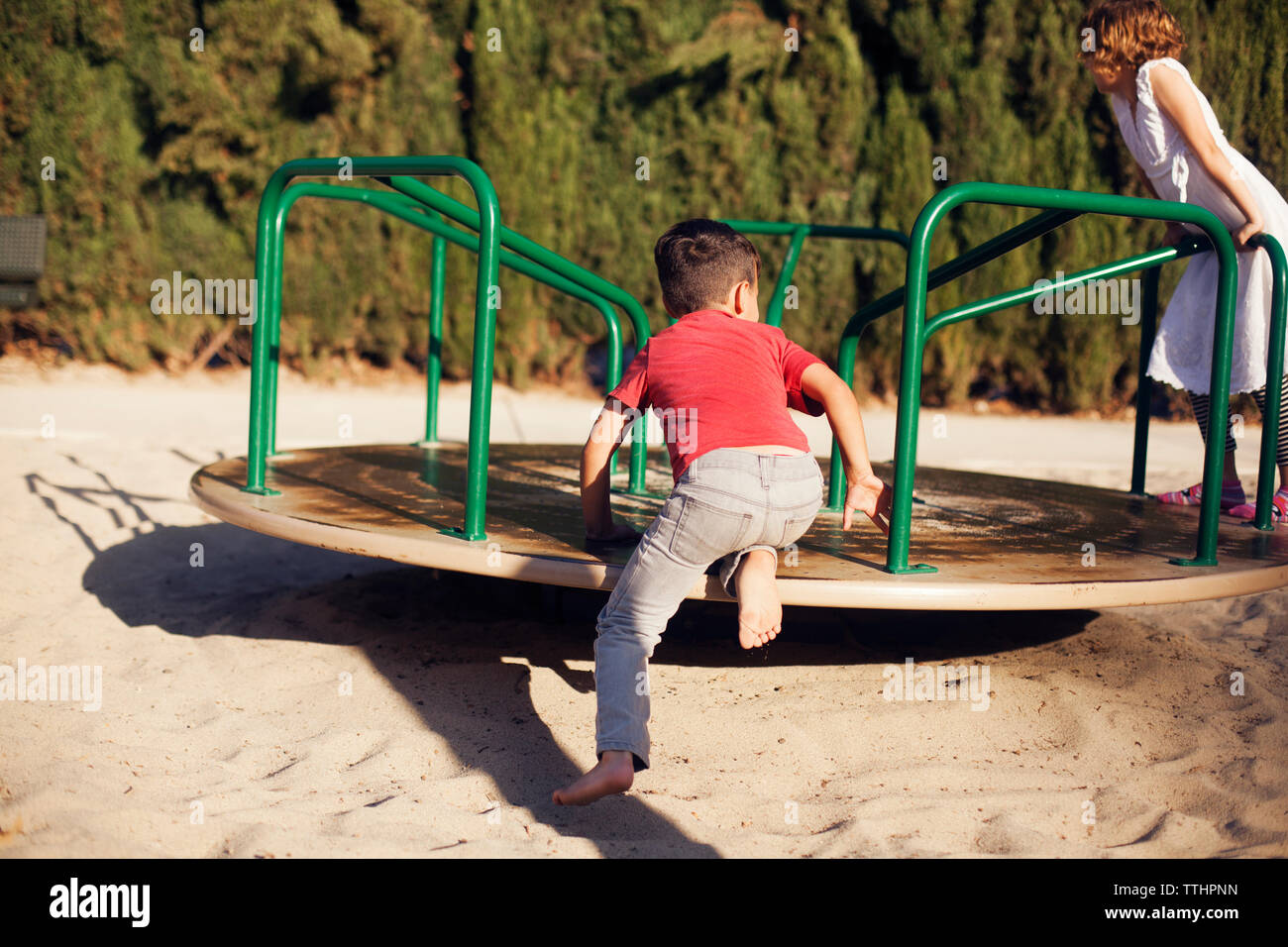 Merry go round girl hi-res stock photography and images - Alamy