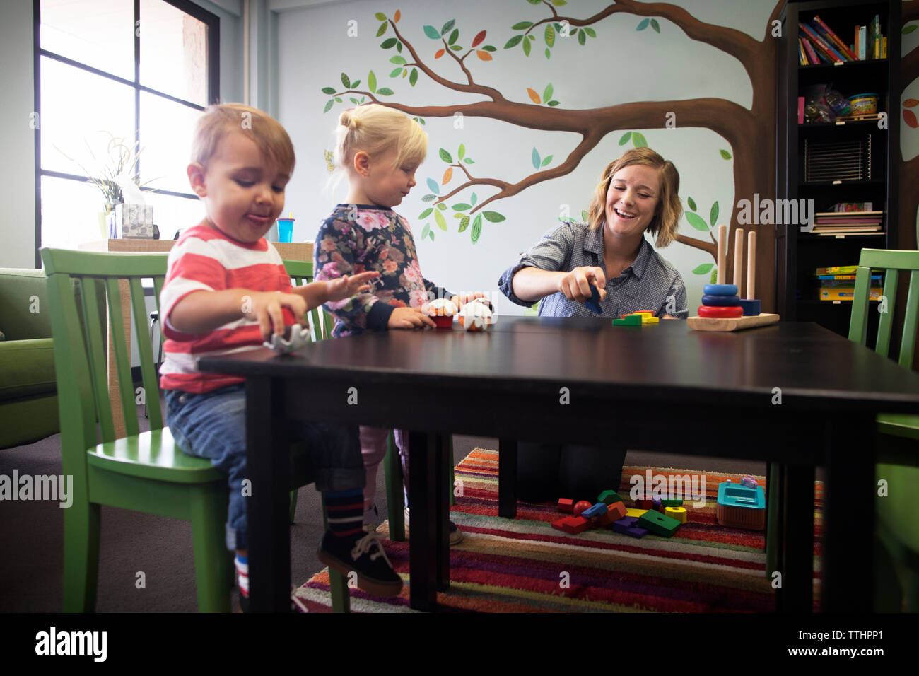 Preschool children playing hi-res stock photography and images - Alamy